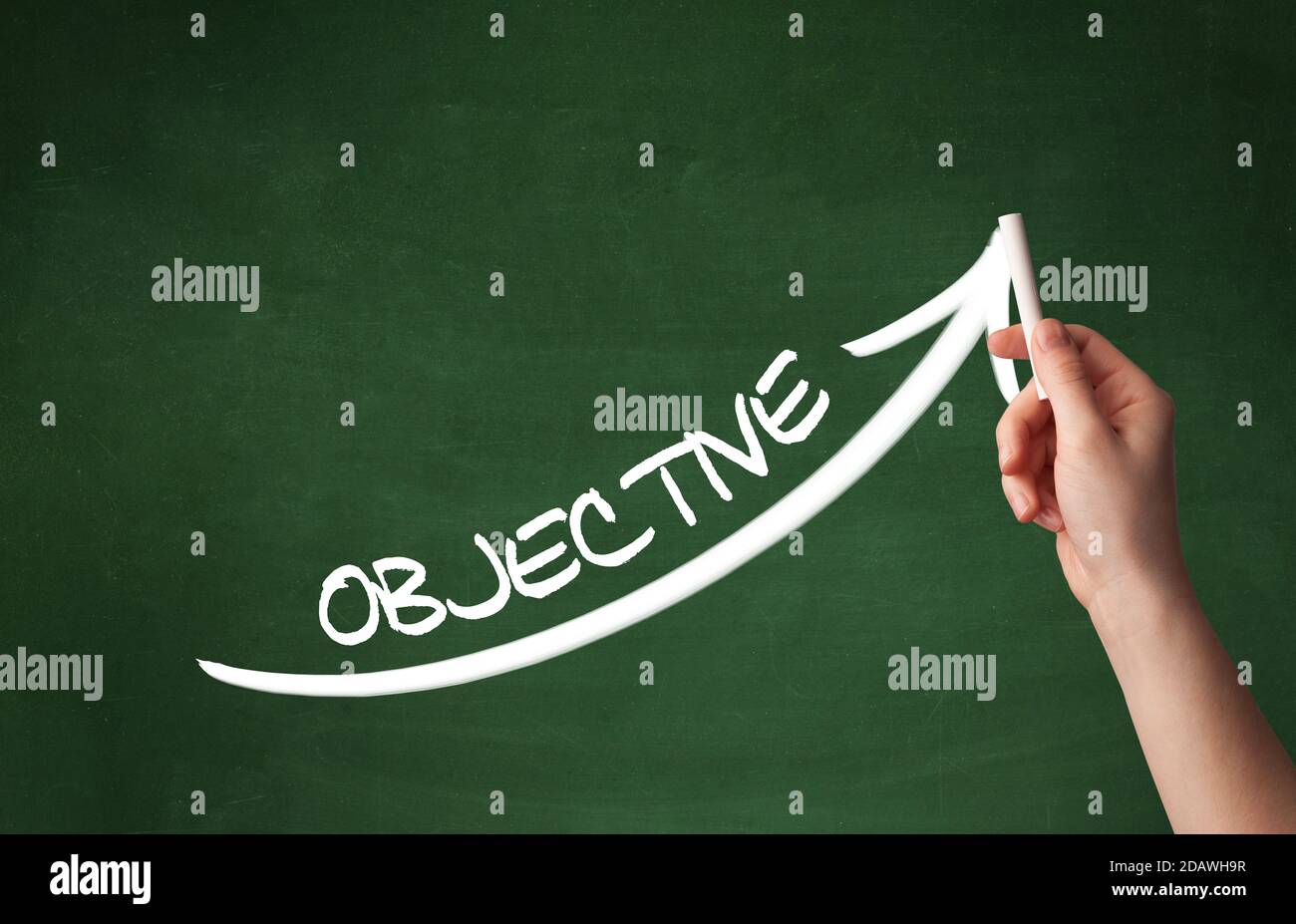 Hand drawing OBJECTIVE inscription with white chalk on blackboard ...