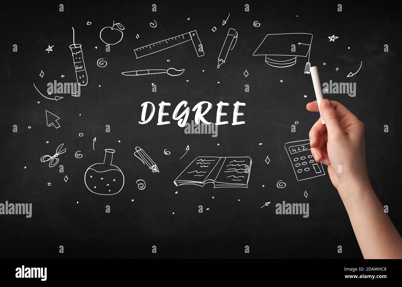 Hand drawing DEGREE inscription with white chalk on blackboard ...