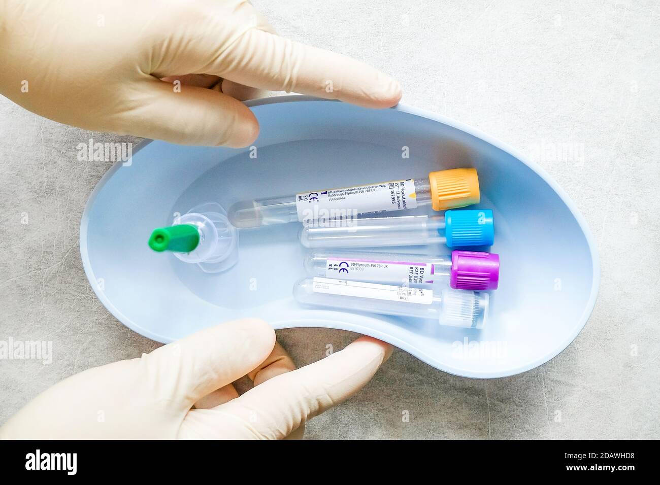 The kidney-shaped container contains vacuum tubes for taking blood for ...