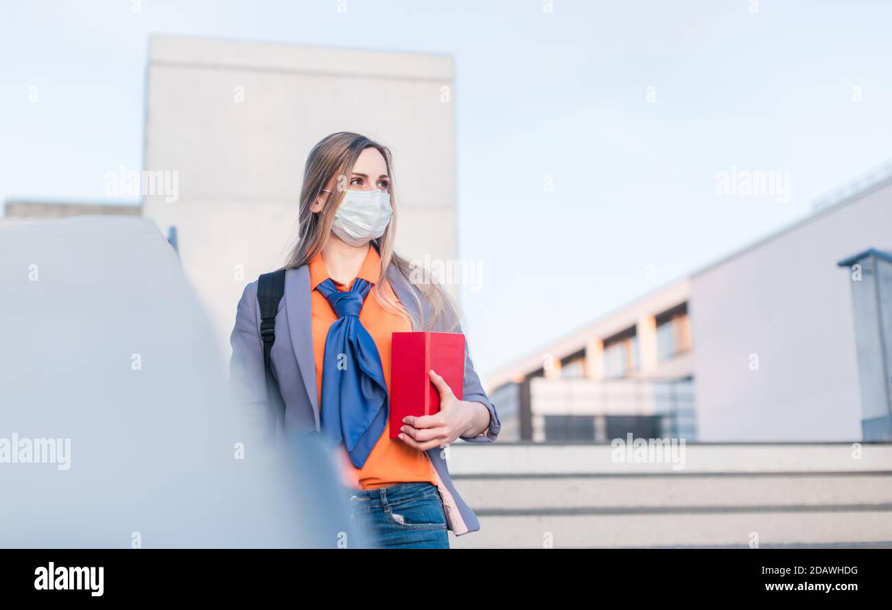 student woman on college campus closed due to covid 19 Stock Photo - Alamy