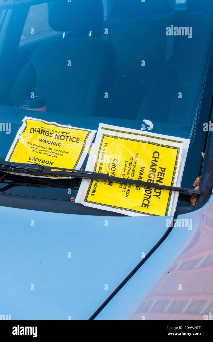 Parking fine enforcement penalty charge notice PCN on car front glass ...