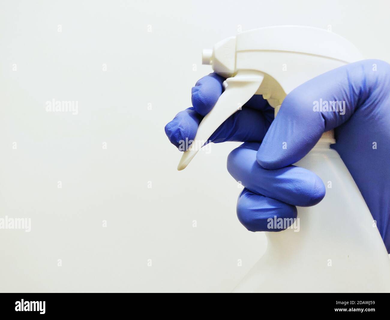 Shot of the cleaning process with spray Stock Photo - Alamy