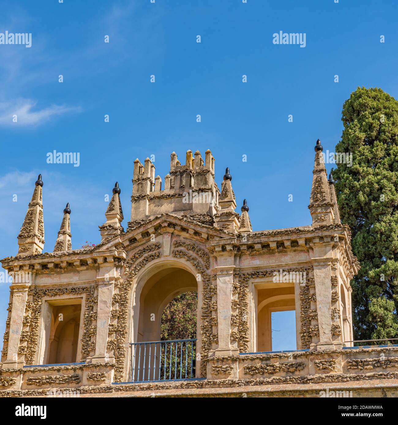 Historical building in the yard of the Real Alcazar Palaces in Seville ...
