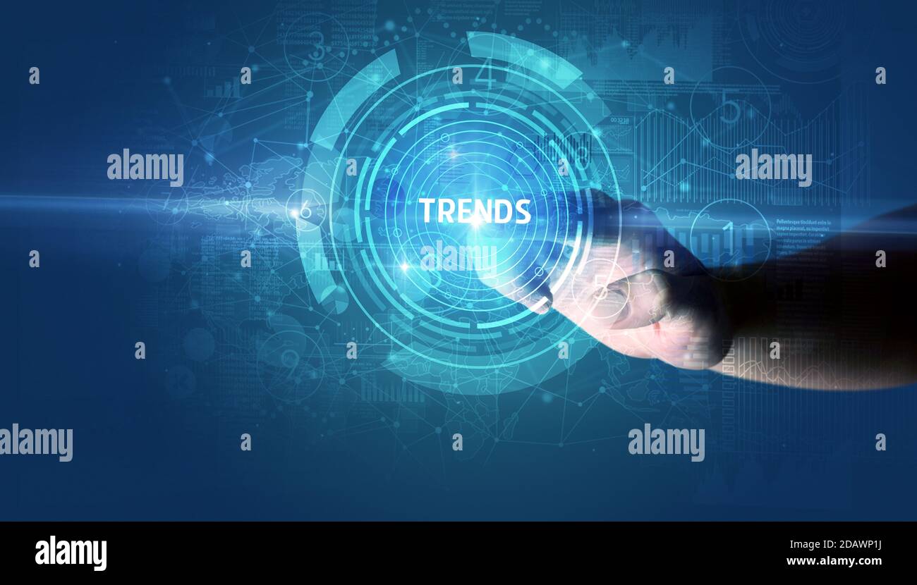 Hand touching TRENDS button, modern business technology concept Stock ...