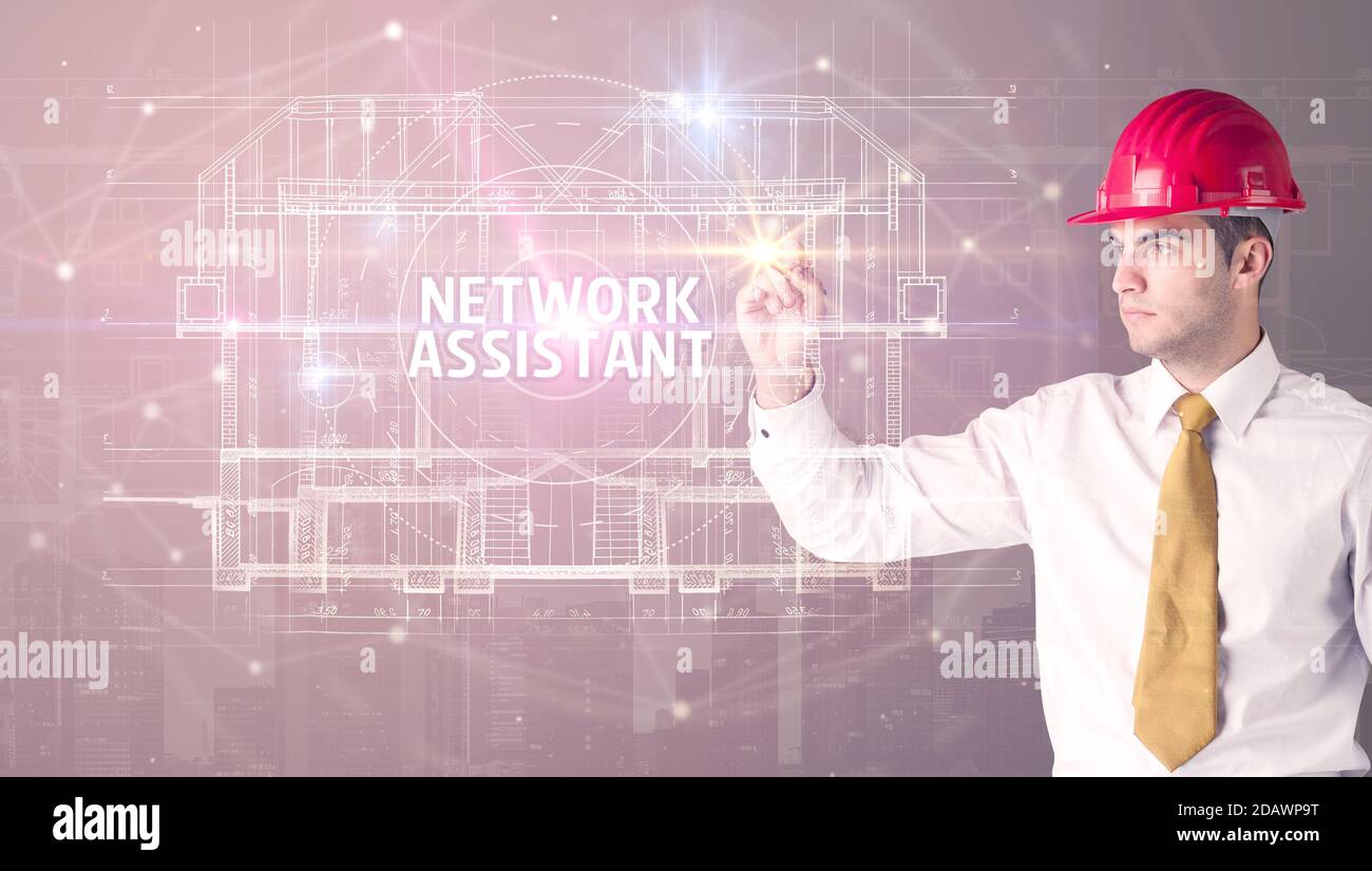 Handsome architect with helmet drawing NETWORK ASSISTANT inscription ...
