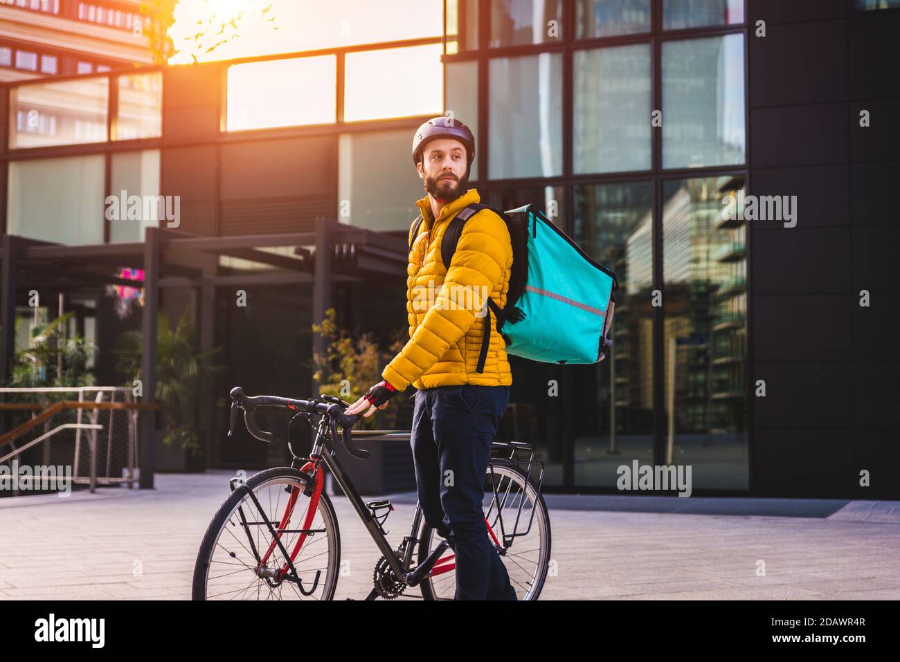 Food delivery service, rider delivering food to clints with bicycle ...