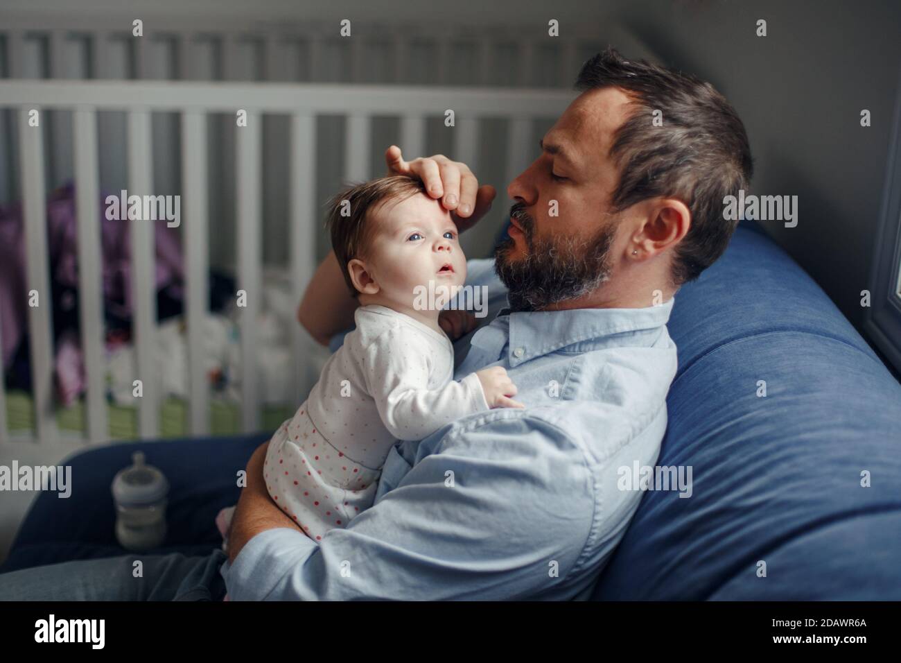 Fathers Day. Caucasian father talking to newborn baby girl. Parent ...