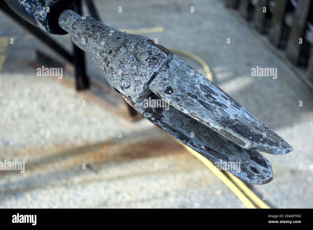 A two blade folding yacht sailboat propeller. The blades fold down when ...