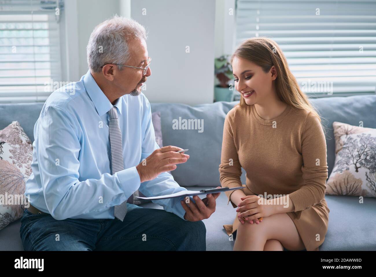 Male psychologist working patient in hi-res stock photography and ...