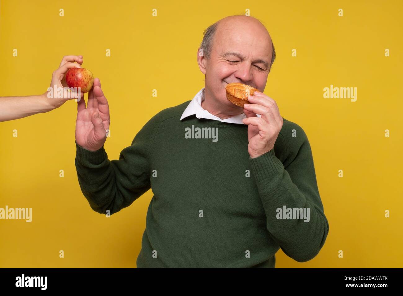 Old man eating fruit hi-res stock photography and images - Alamy