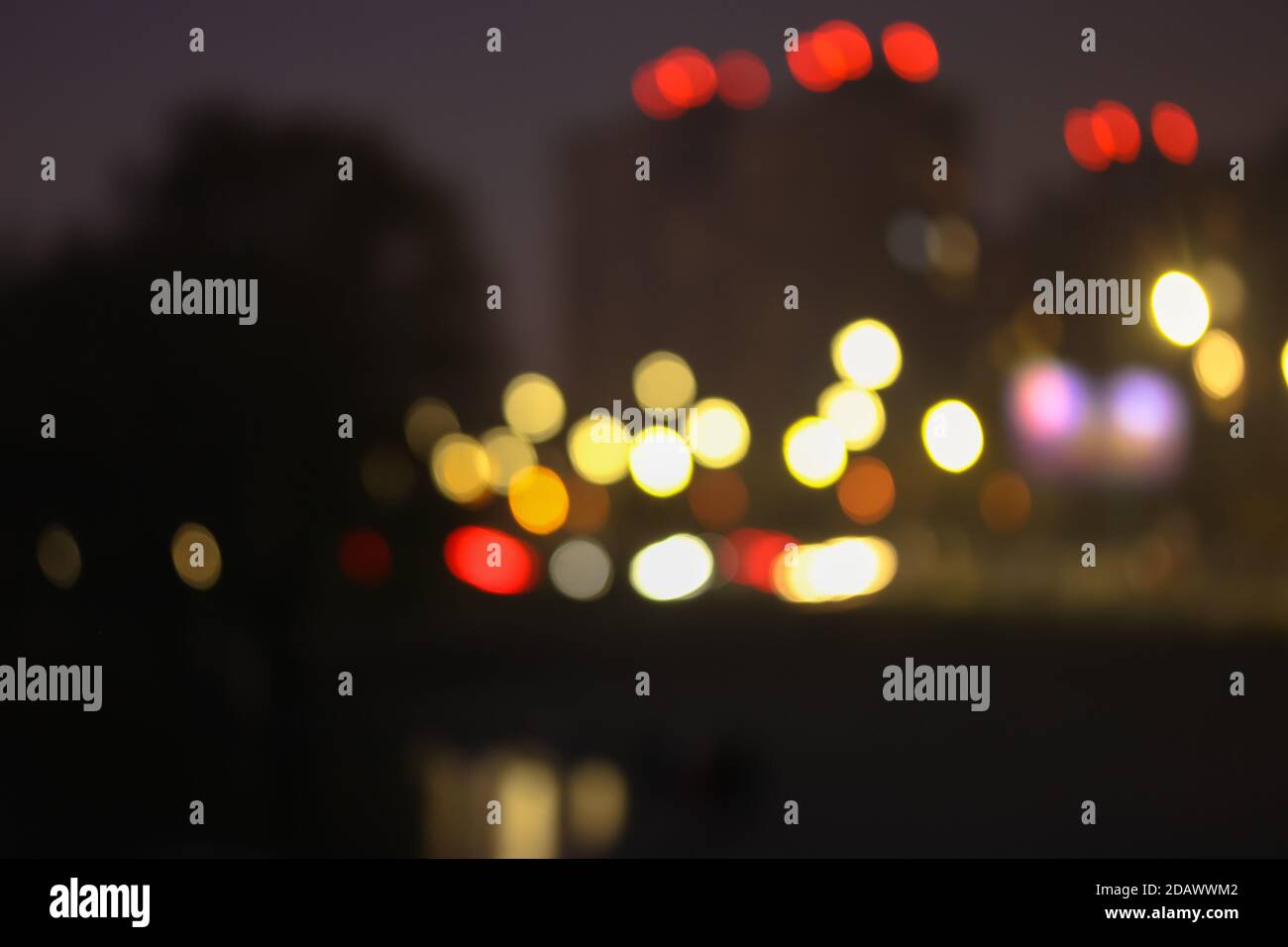 The facade of the apartment building, light in the windows in the ...