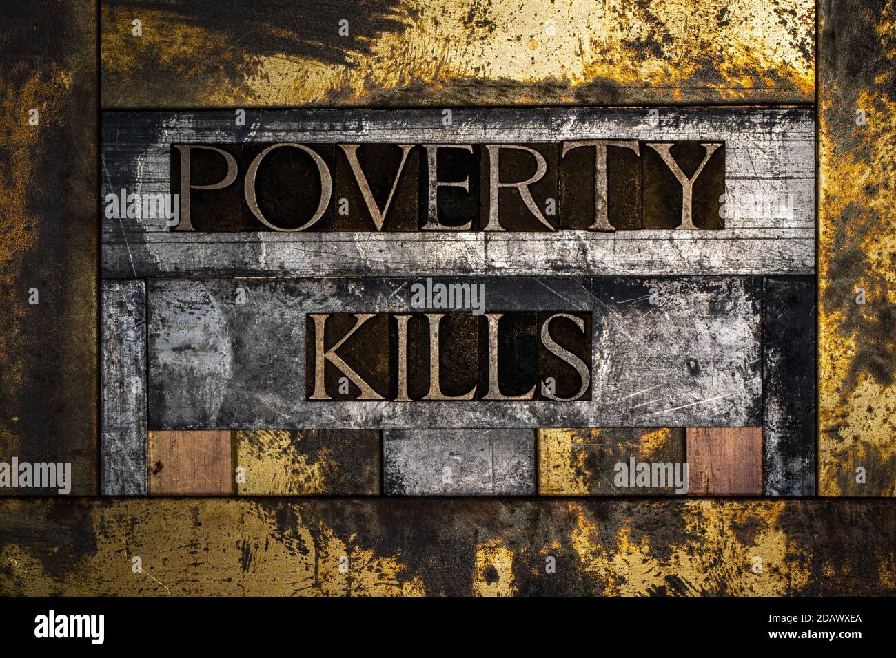 Poverty Kills text message on textured grunge copper and vintage gold ...