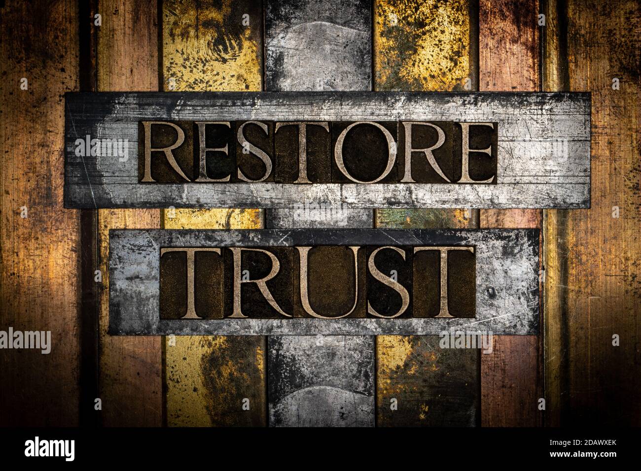 Restore Trust text message on vintage textured grunge lead and copper ...