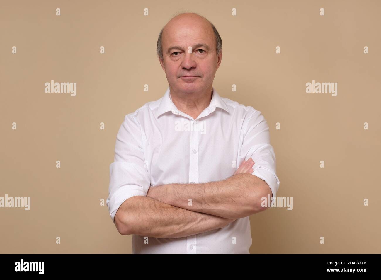 Elegant senior bald man smiling confident at camera Stock Photo - Alamy