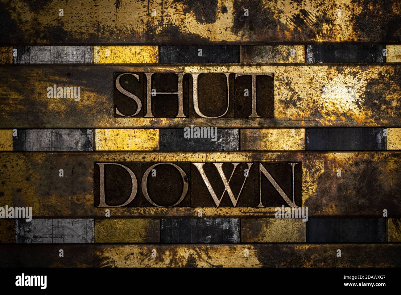 Shut Down text message on vintage textured grunge copper and gold ...