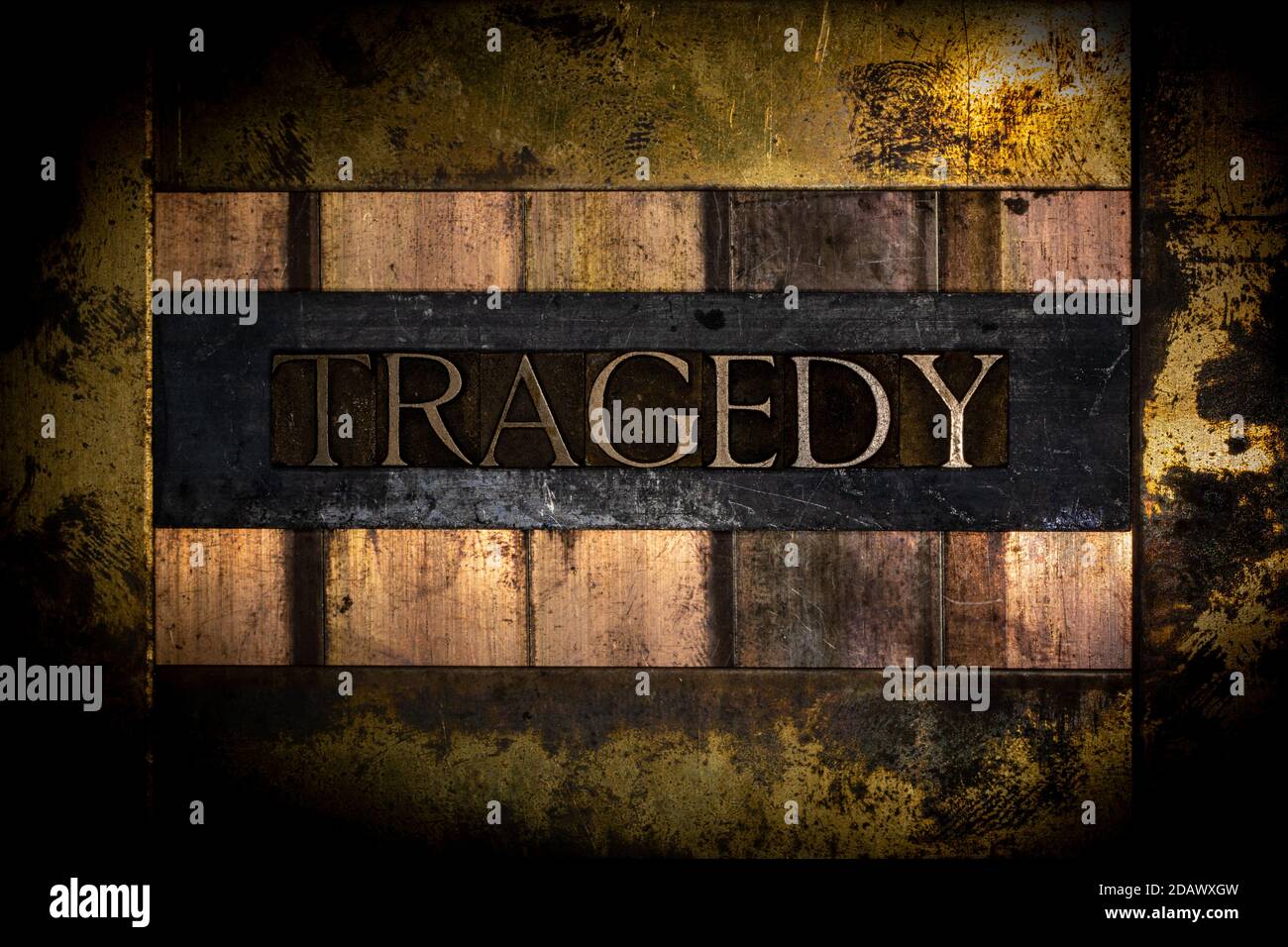Tragedy text message on vintage textured grunge copper and gold ...