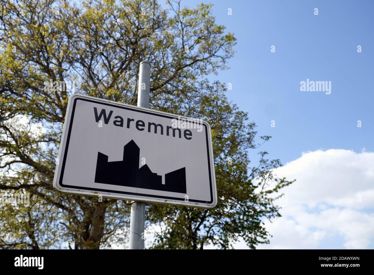 Illustration shows the name of the Waremme municipality on a road sign ...