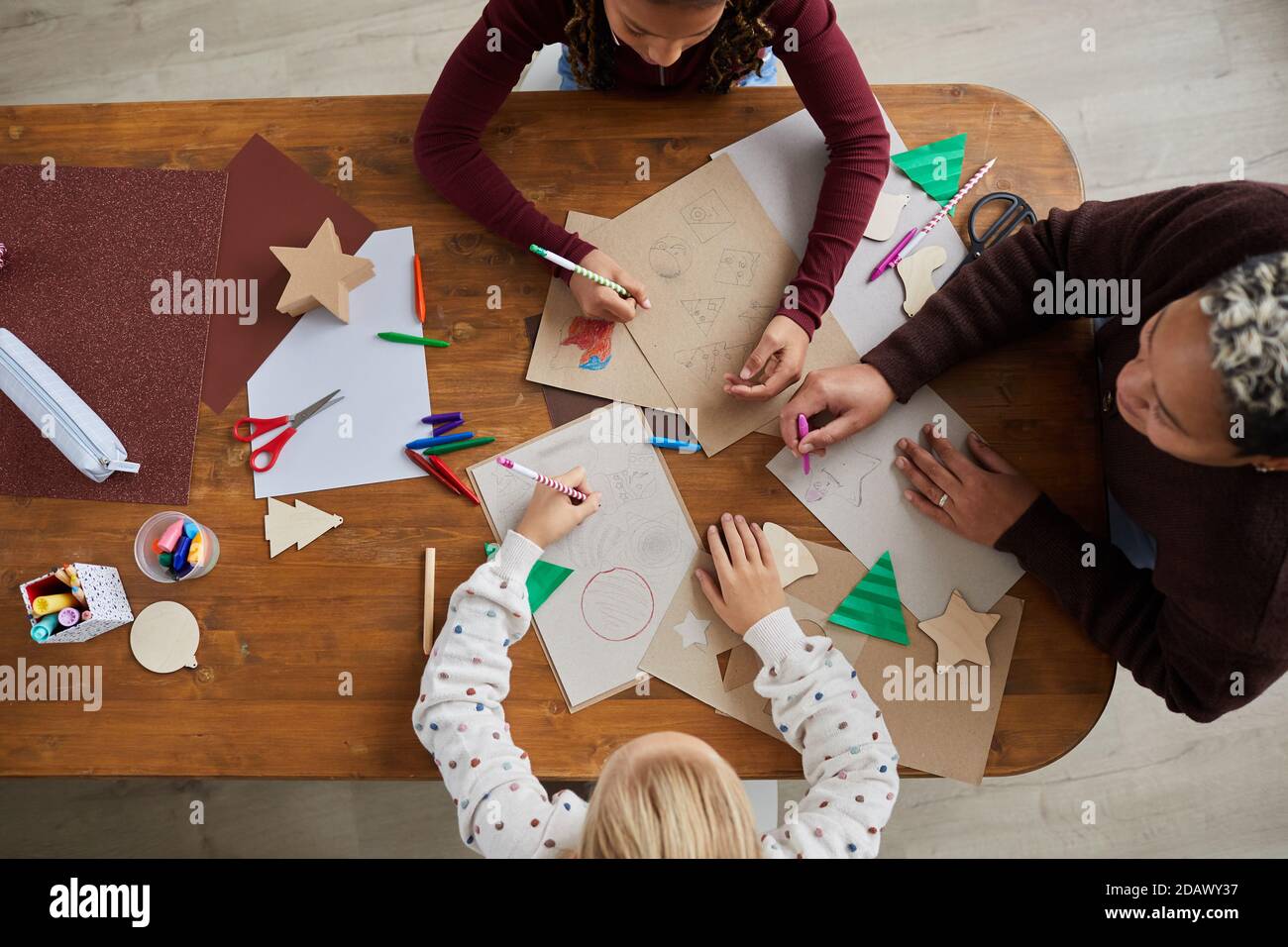 Children drawing in class during hi-res stock photography and images ...