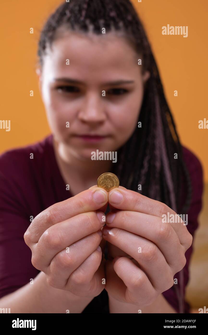 Penny coin one woman hi-res stock photography and images - Alamy