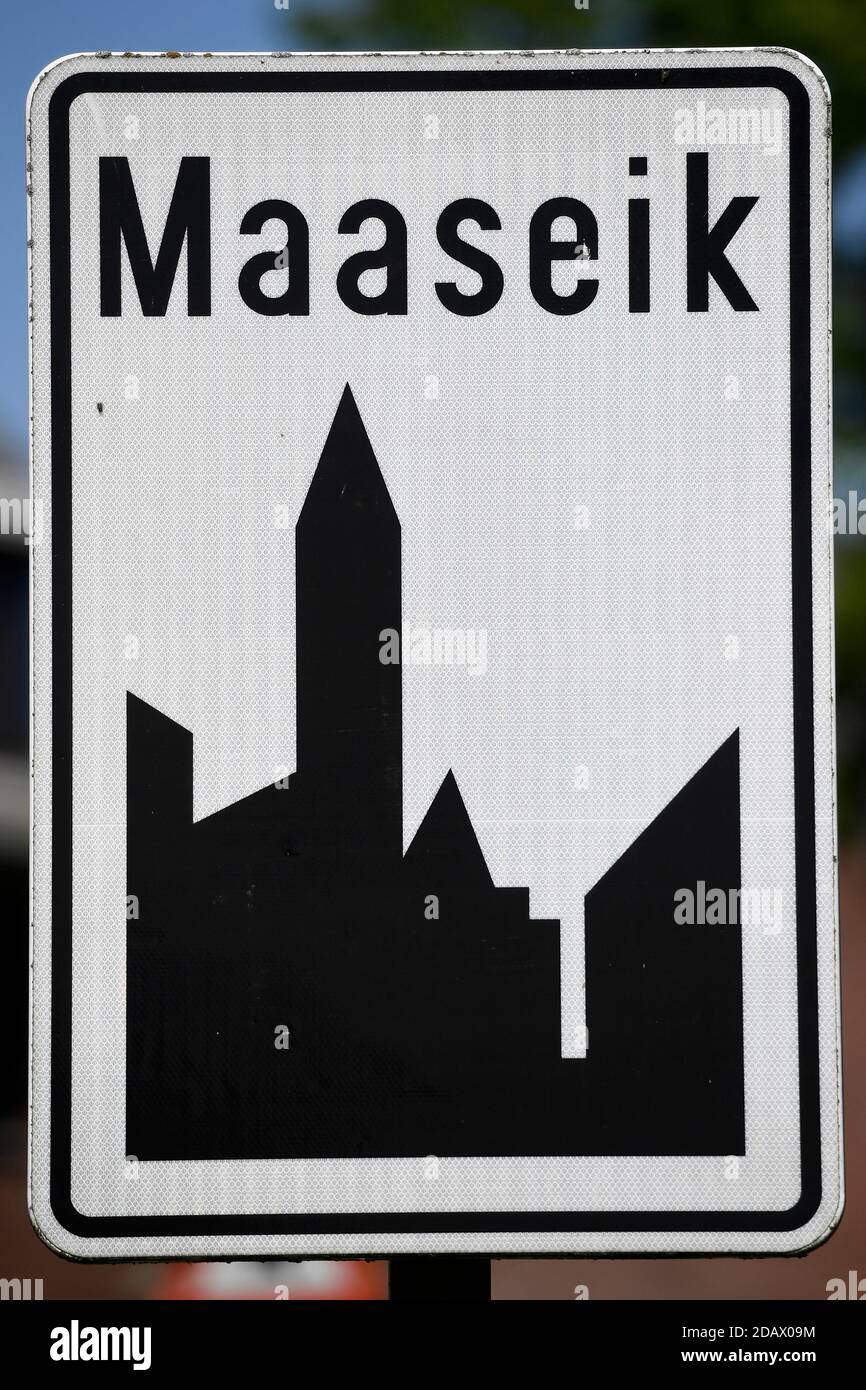 Illustration shows the name of the Maaseik municipality on a road sign ...