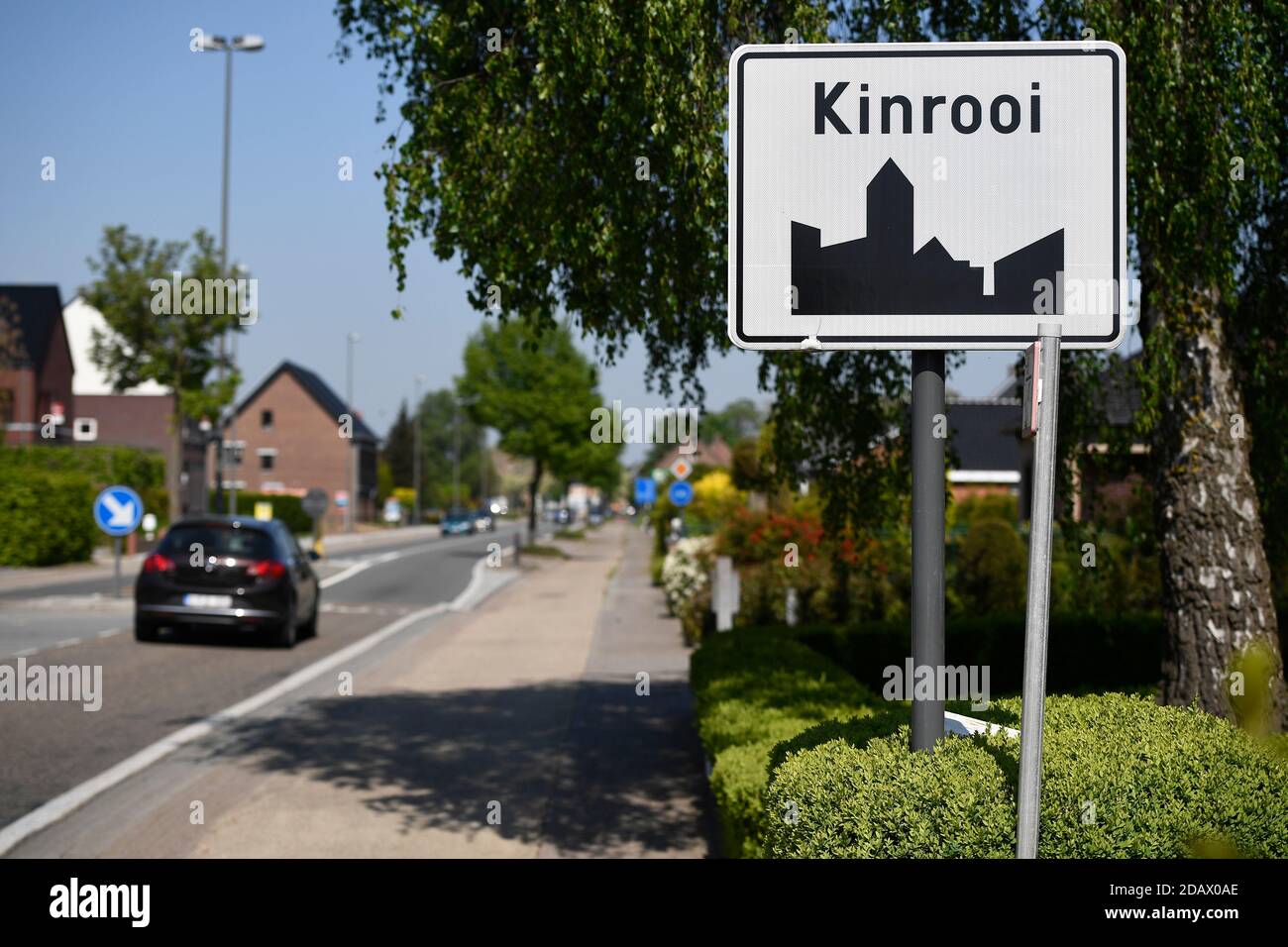 Illustration shows the name of the Kinrooi municipality on a road sign ...