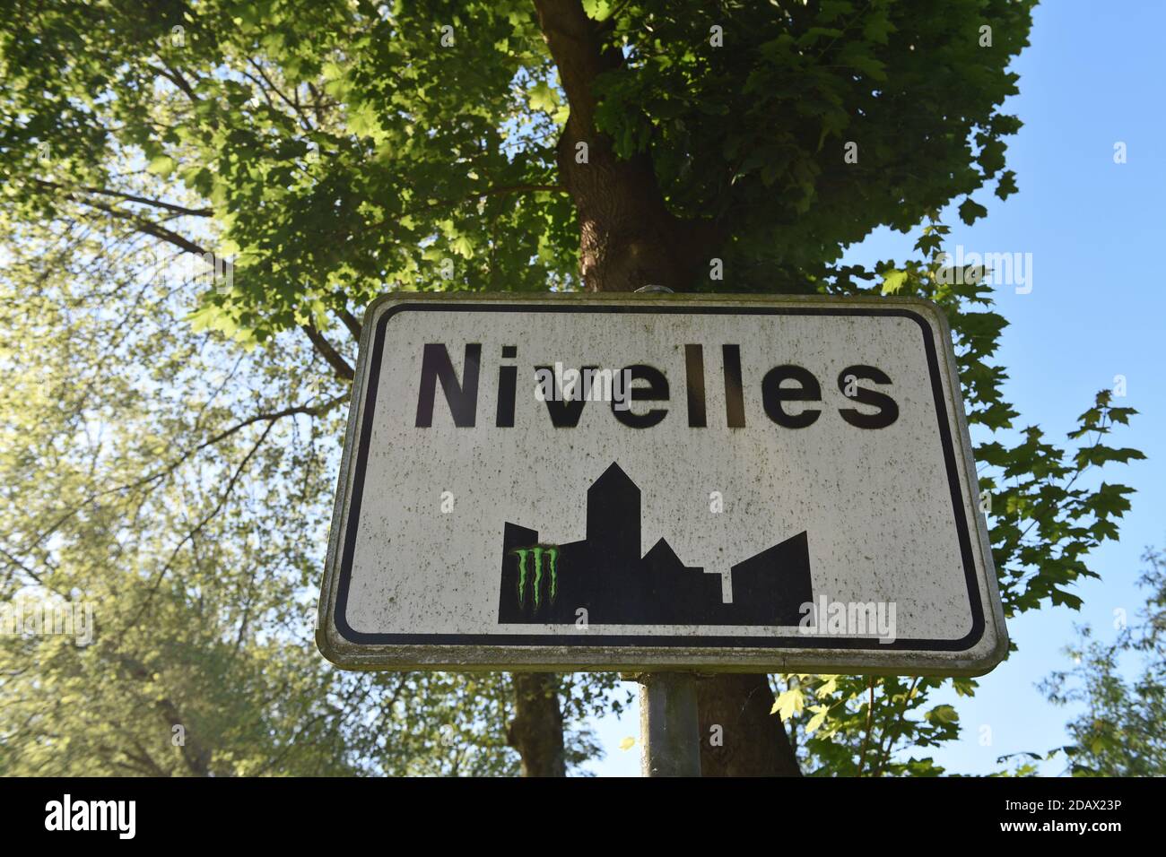 Illustration shows the name of the Nivelles municipality on a road sign ...