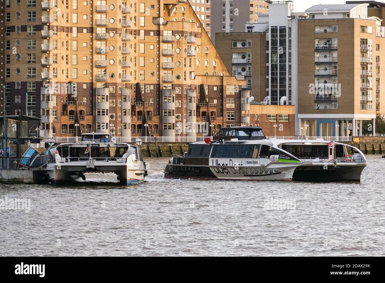 Thames clipper at the Canary Wharf Pier, London England United Kingdom ...