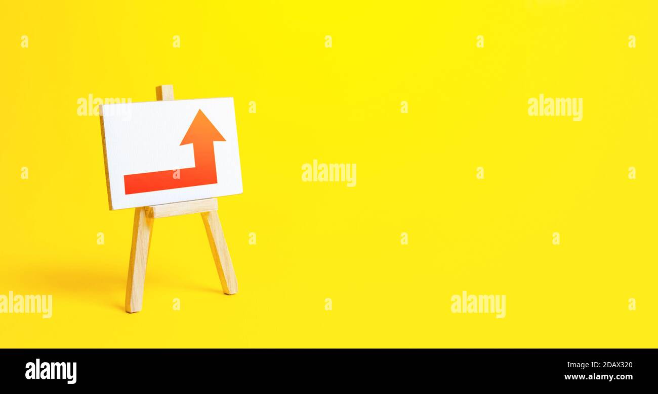 Easel with a red right up arrow. Direction to go around. Bypassing ...