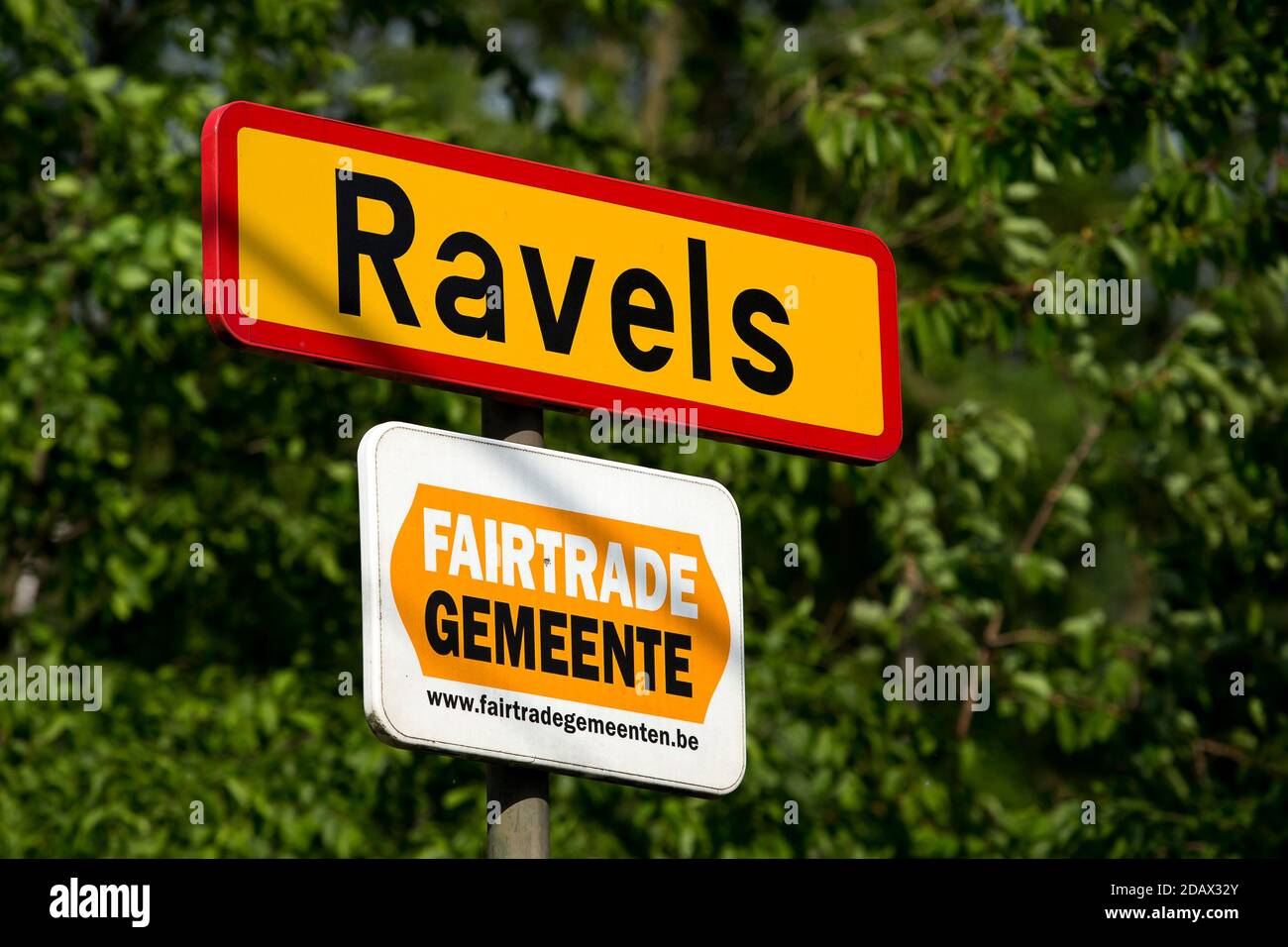 Illustration shows the name of the Ravels municipality on a road sign ...