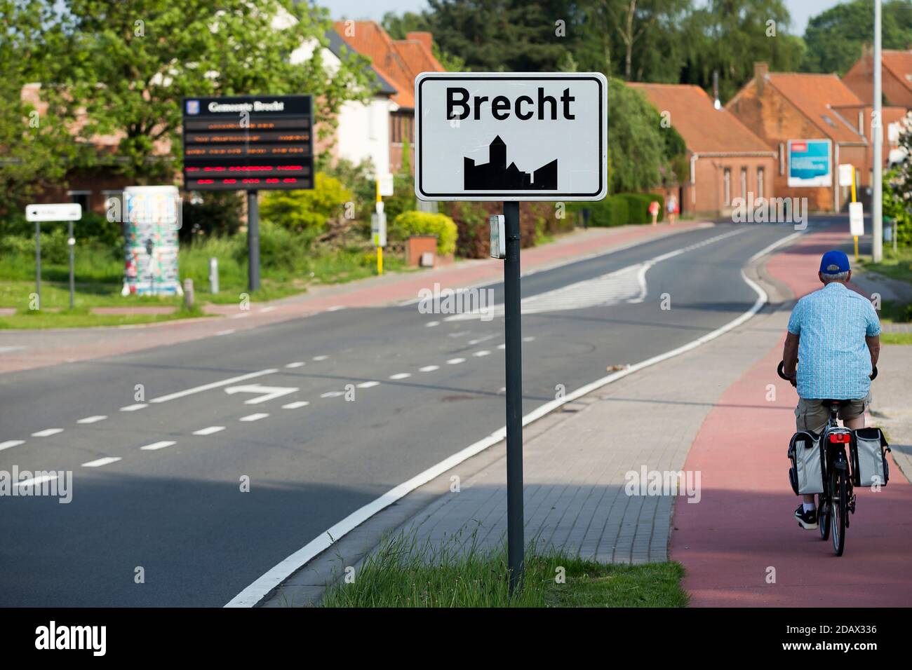 Illustration shows the name of the Brecht municipality on a road sign ...