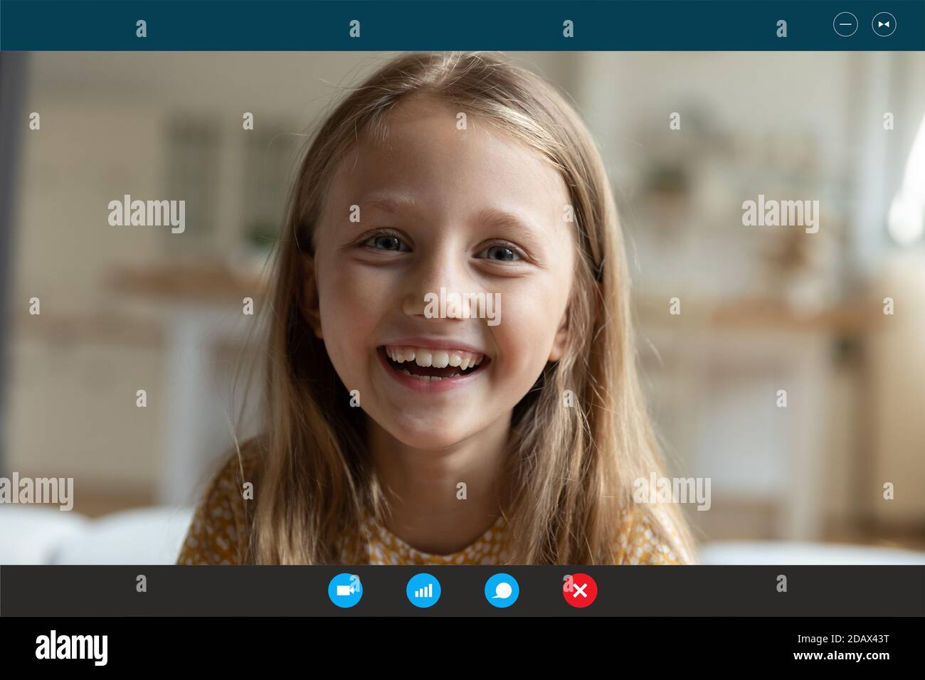 Little happy caucasian girl looking at web camera Stock Photo - Alamy