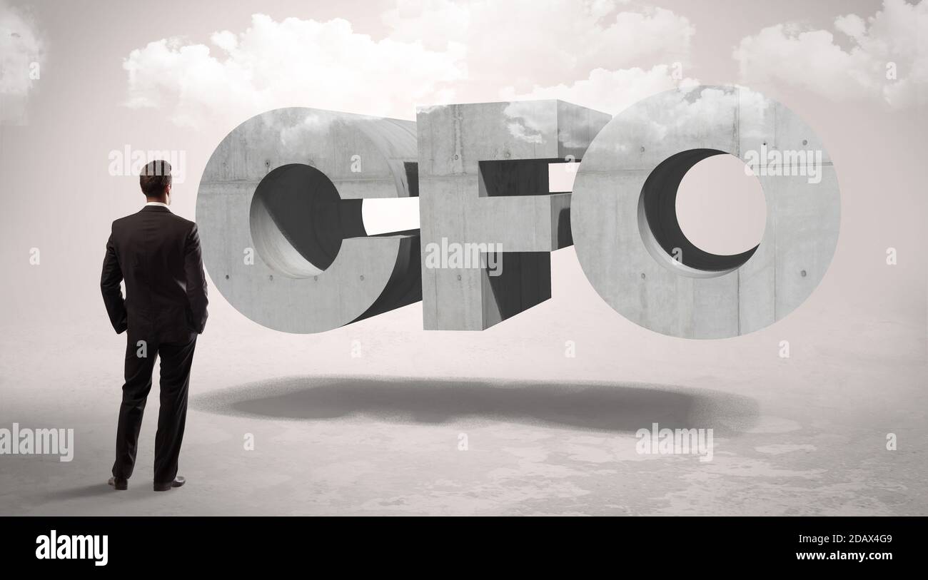 Rear view of a businessman standing in front of CFO abbreviation ...