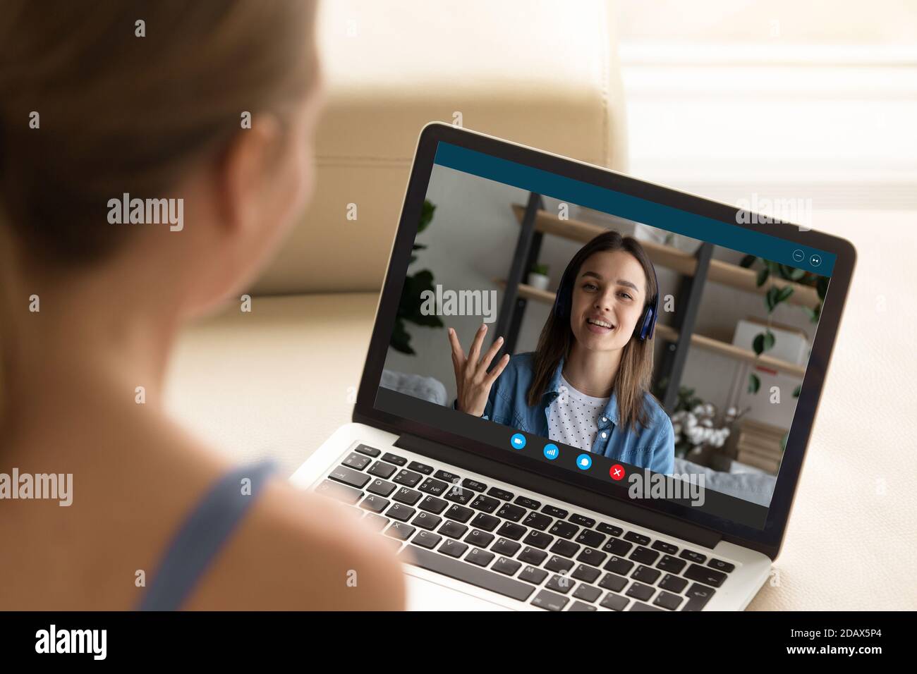 Young woman enjoying web cam video call conversation with friend Stock ...