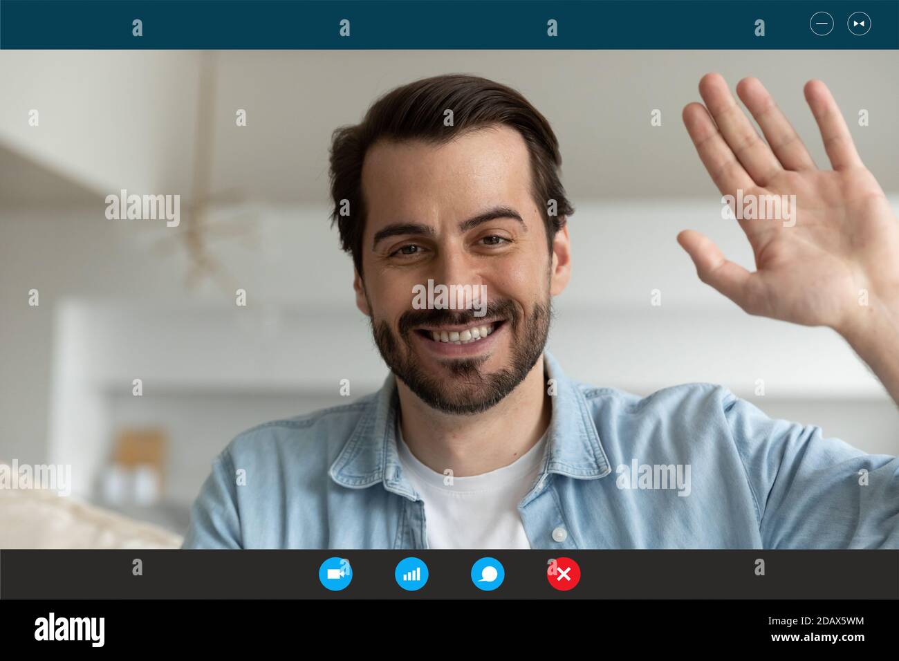 Young bearded man waving hand, greeting friend at online meeting Stock ...