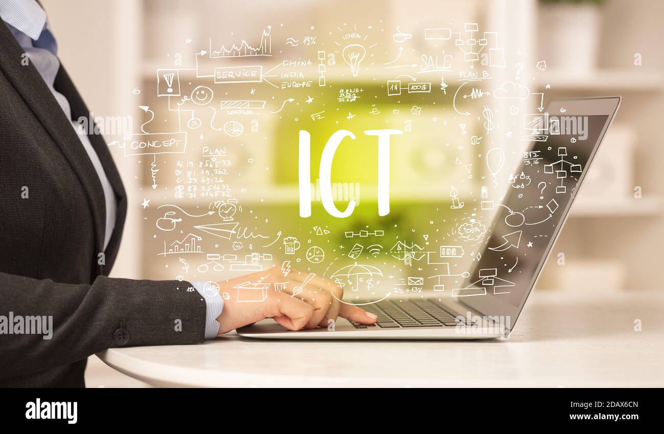 hand working on new modern computer with ICT abbreviation, modern ...