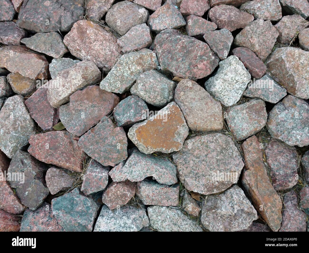 large red tan stone rocks pile group overhead view with deep shadows ...