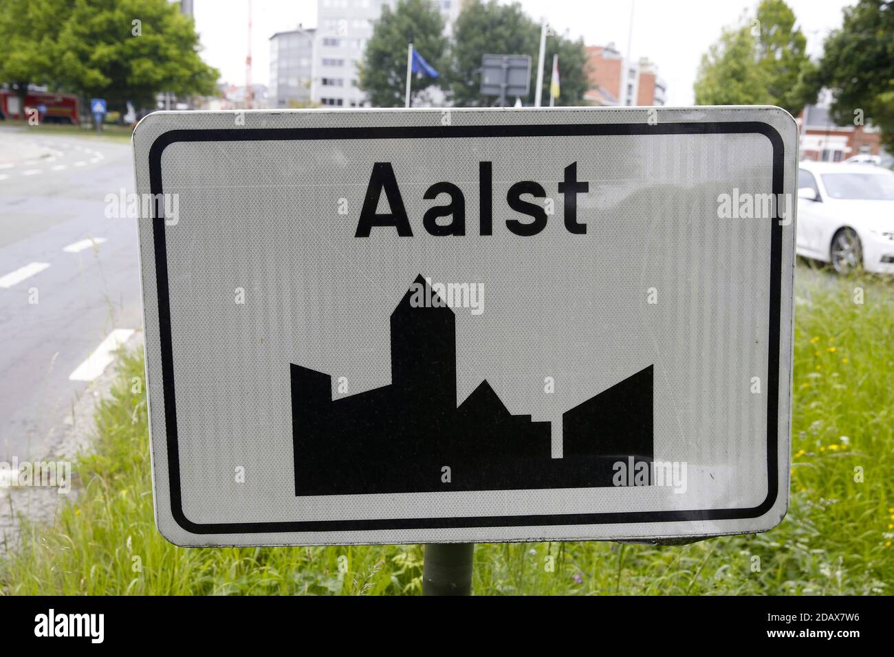 Illustration shows the name of the Aalst municipality on a road sign ...