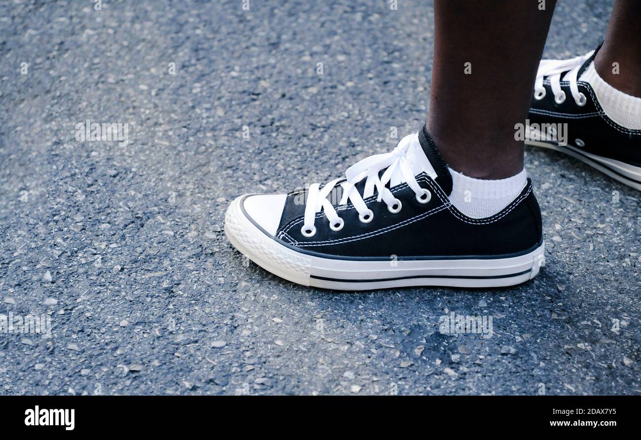 Black legs of the female protester during a manifestation of the "black ...