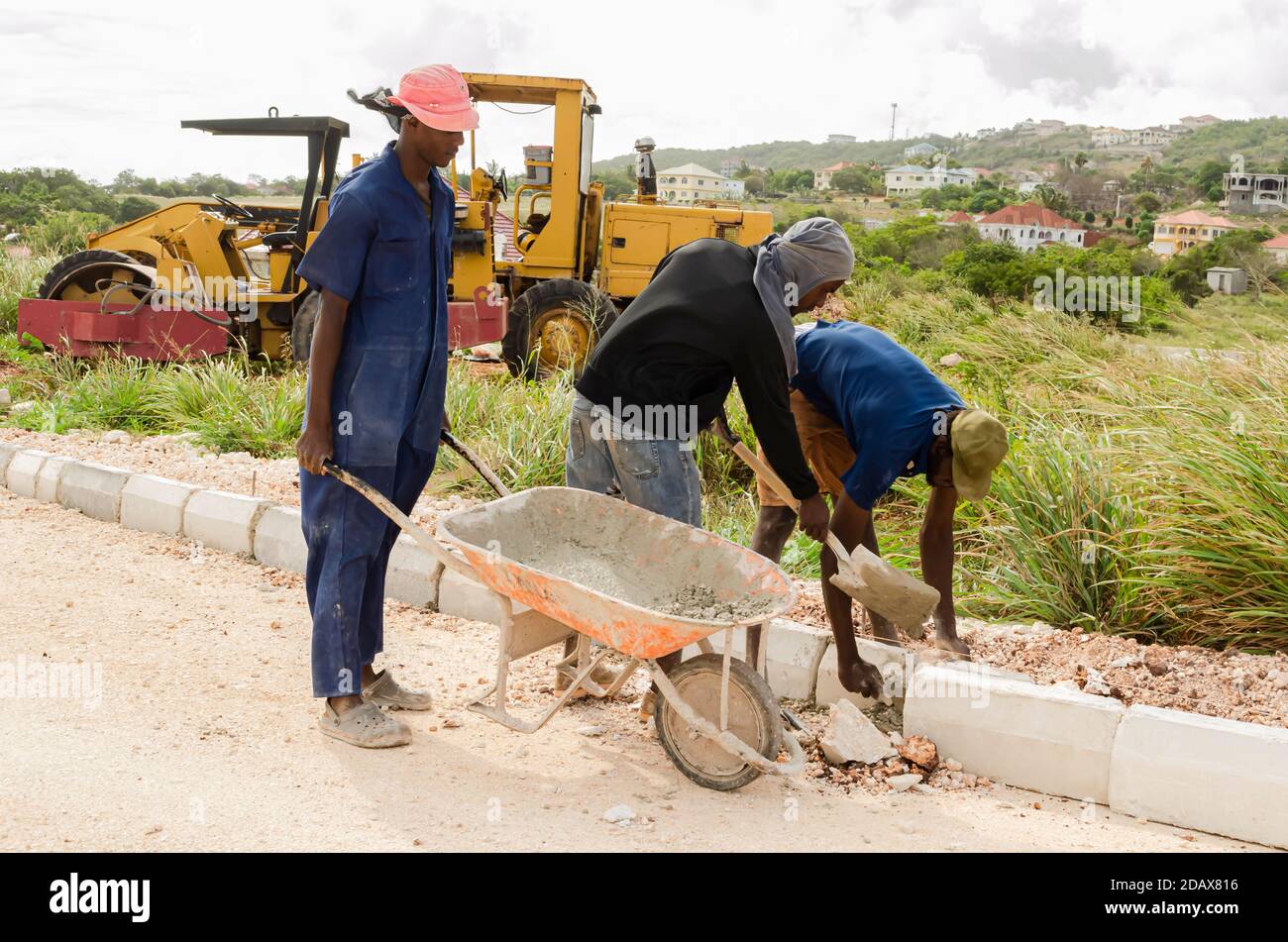 At a road construction site, at the roundabout where there is a parked ...