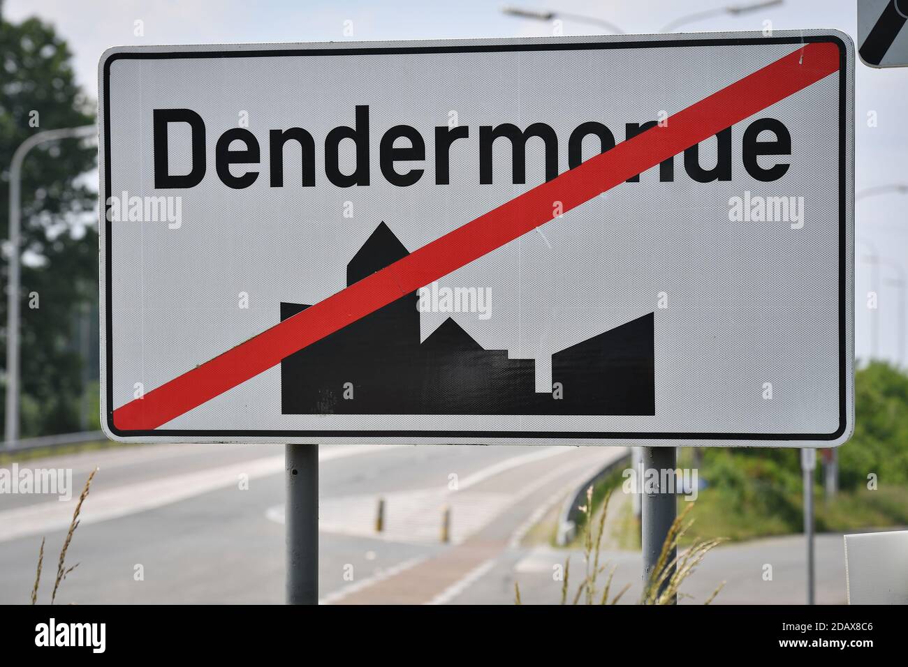 Illustration shows the name of the Dendermonde municipality on a road ...