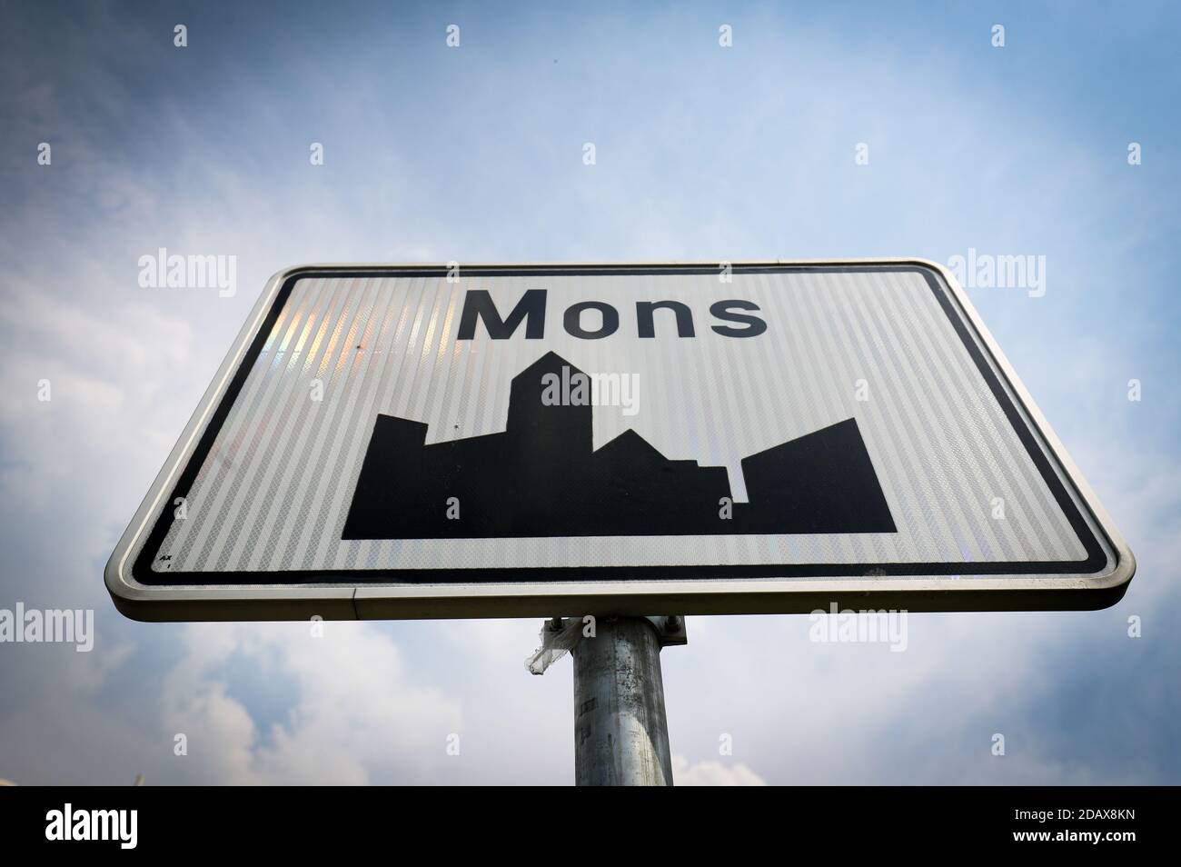 Illustration shows the name of the Mons municipality on a road sign ...