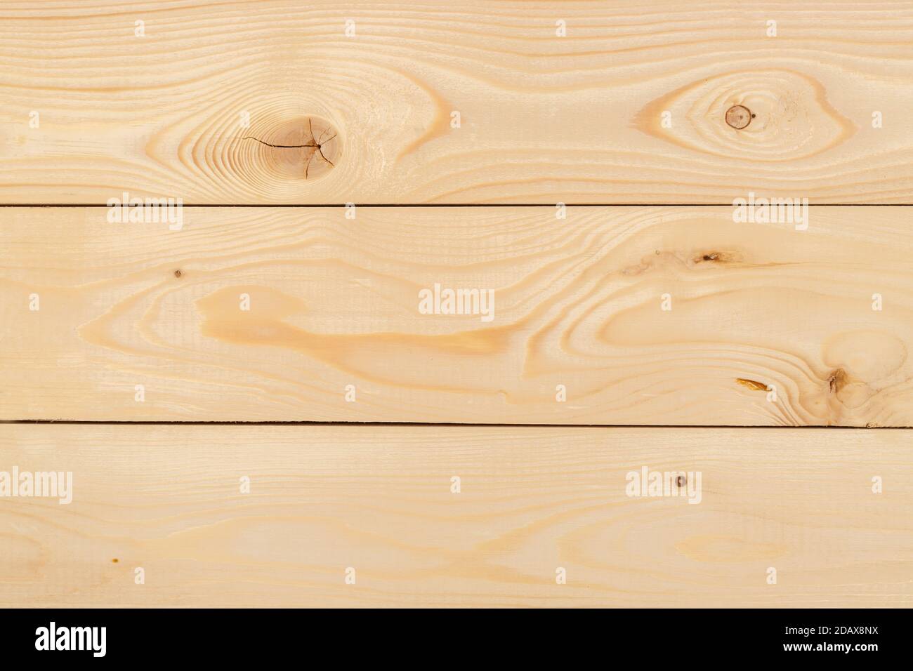 Freshly planed wooden boards closeup. Texture of freshly planed boards ...