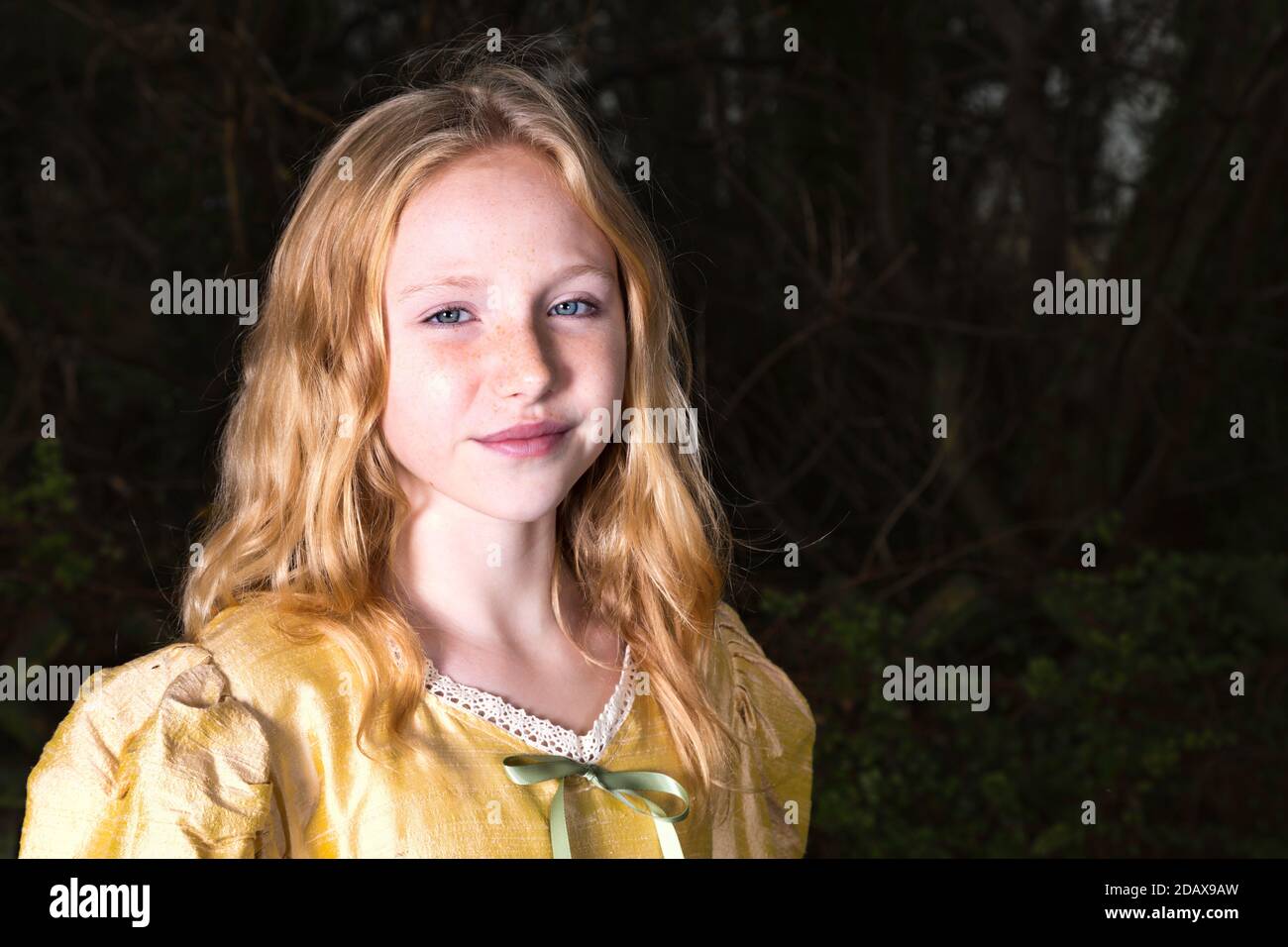 Portrait of a pretty 12-year-old wearing a period costume Stock Photo ...