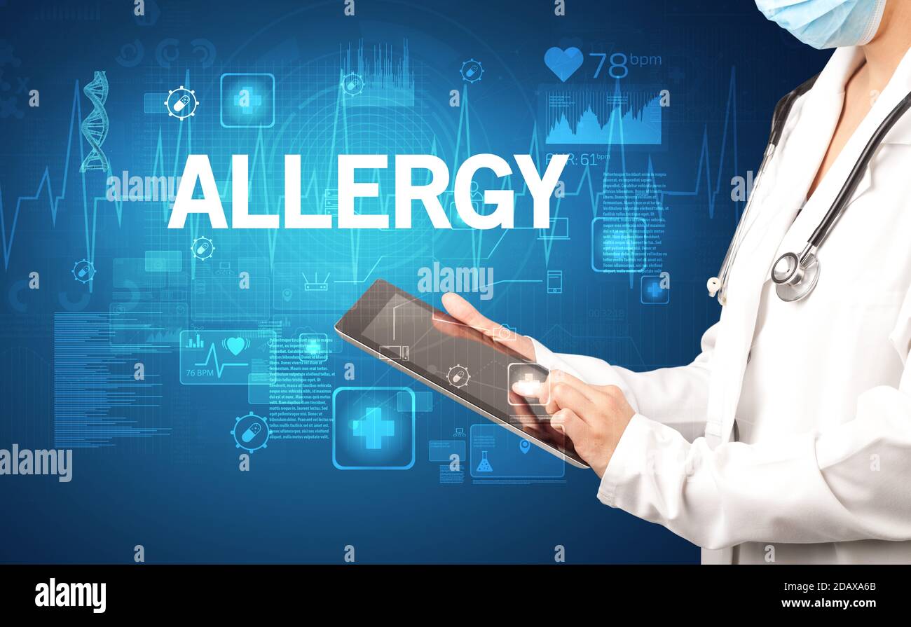 young doctor writing down notes with ALLERGY inscription, healthcare ...