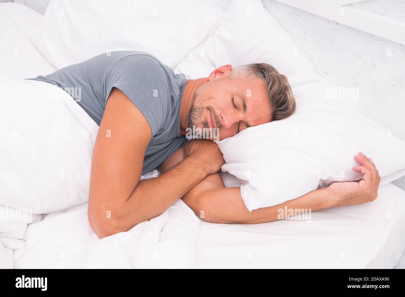 Sleeping guy at home. Relaxed man. Promote prevention and management of ...
