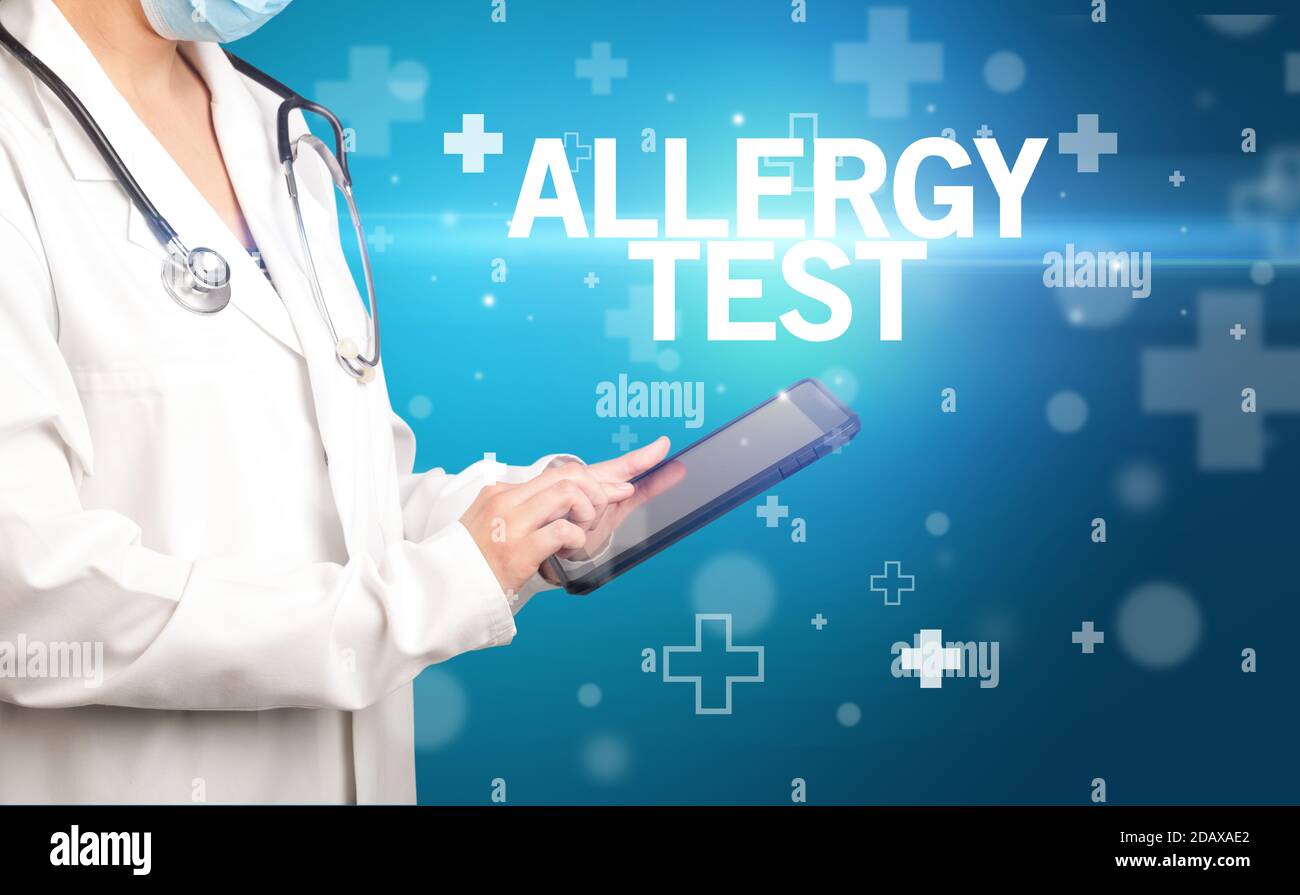 doctor writes notes on the clipboard with ALLERGY TEST inscription ...