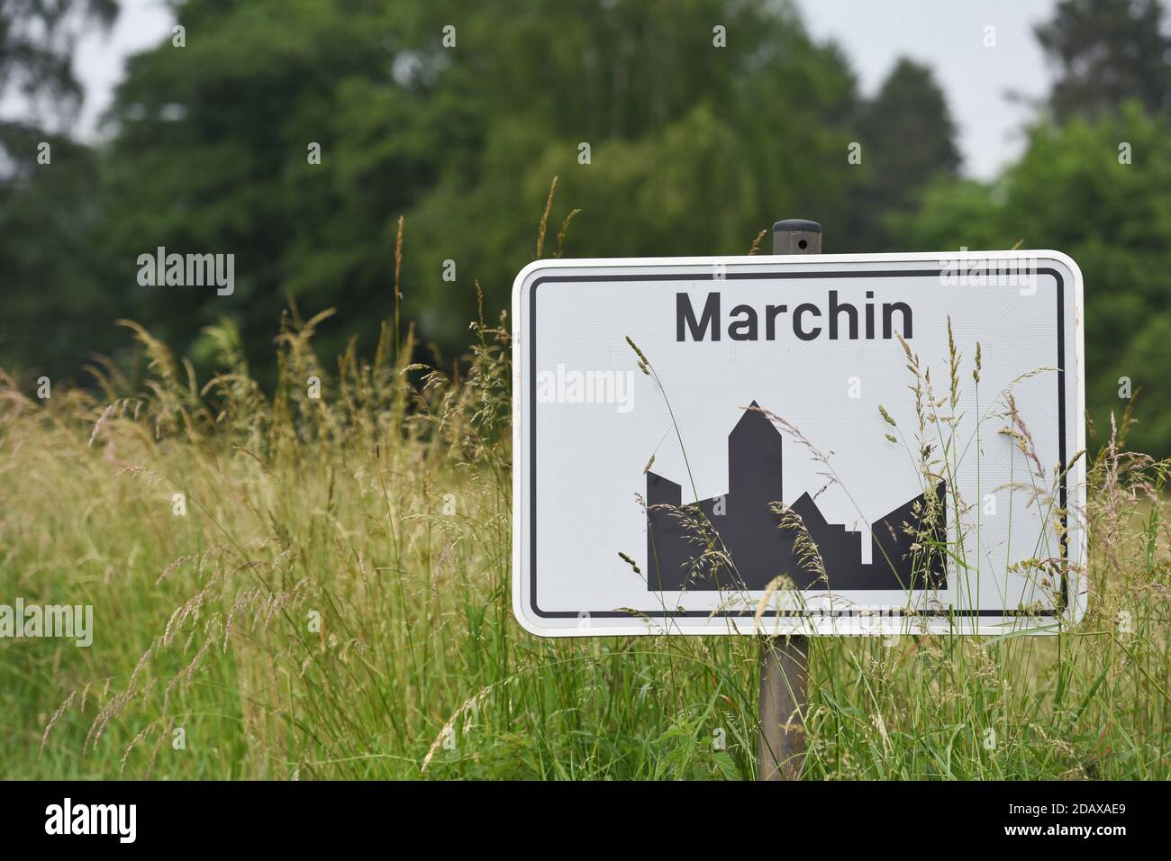 Illustration shows the name of the Marchin municipality on a road sign ...