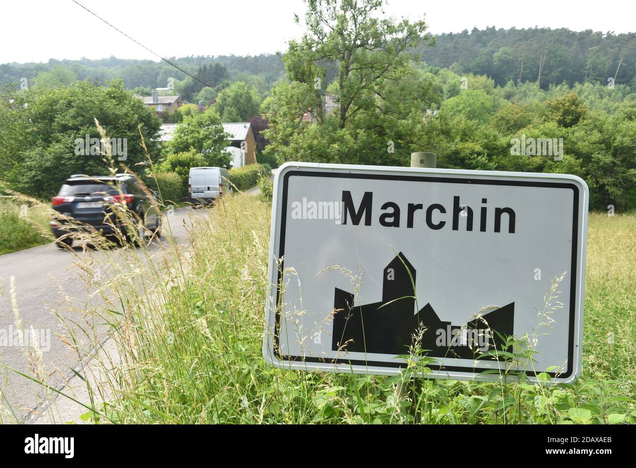 Illustration shows the name of the Marchin municipality on a road sign ...