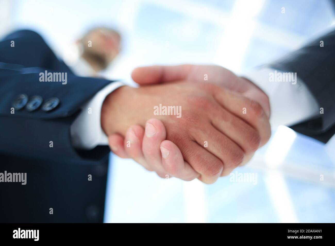 bottom view.handshake business people Stock Photo - Alamy