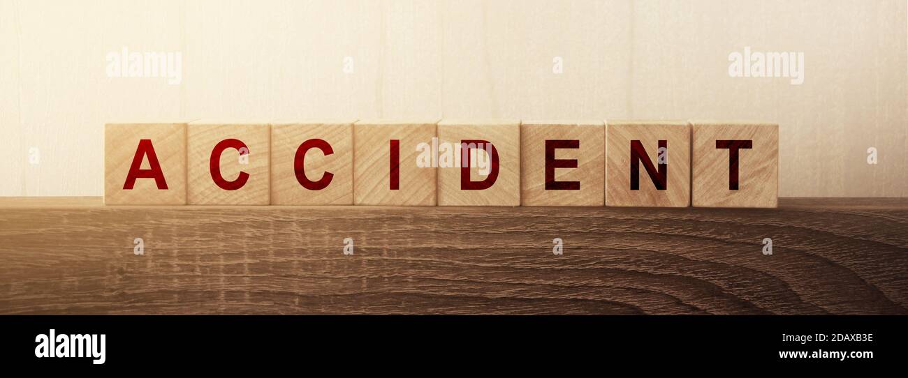 Accident word made with wooden building block. Insurance concept Stock ...